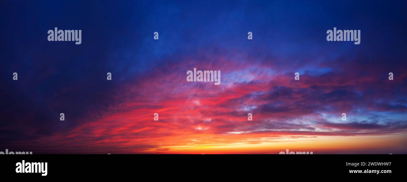 Dramatic sunset sky background. Panorama of twilight sky with clouds ...