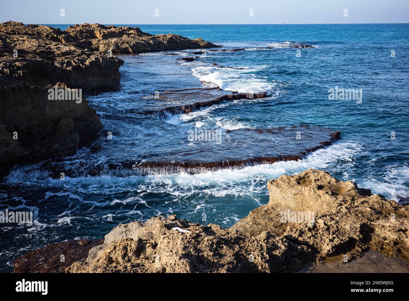 Breaking wavelets hi-res stock photography and images - Alamy