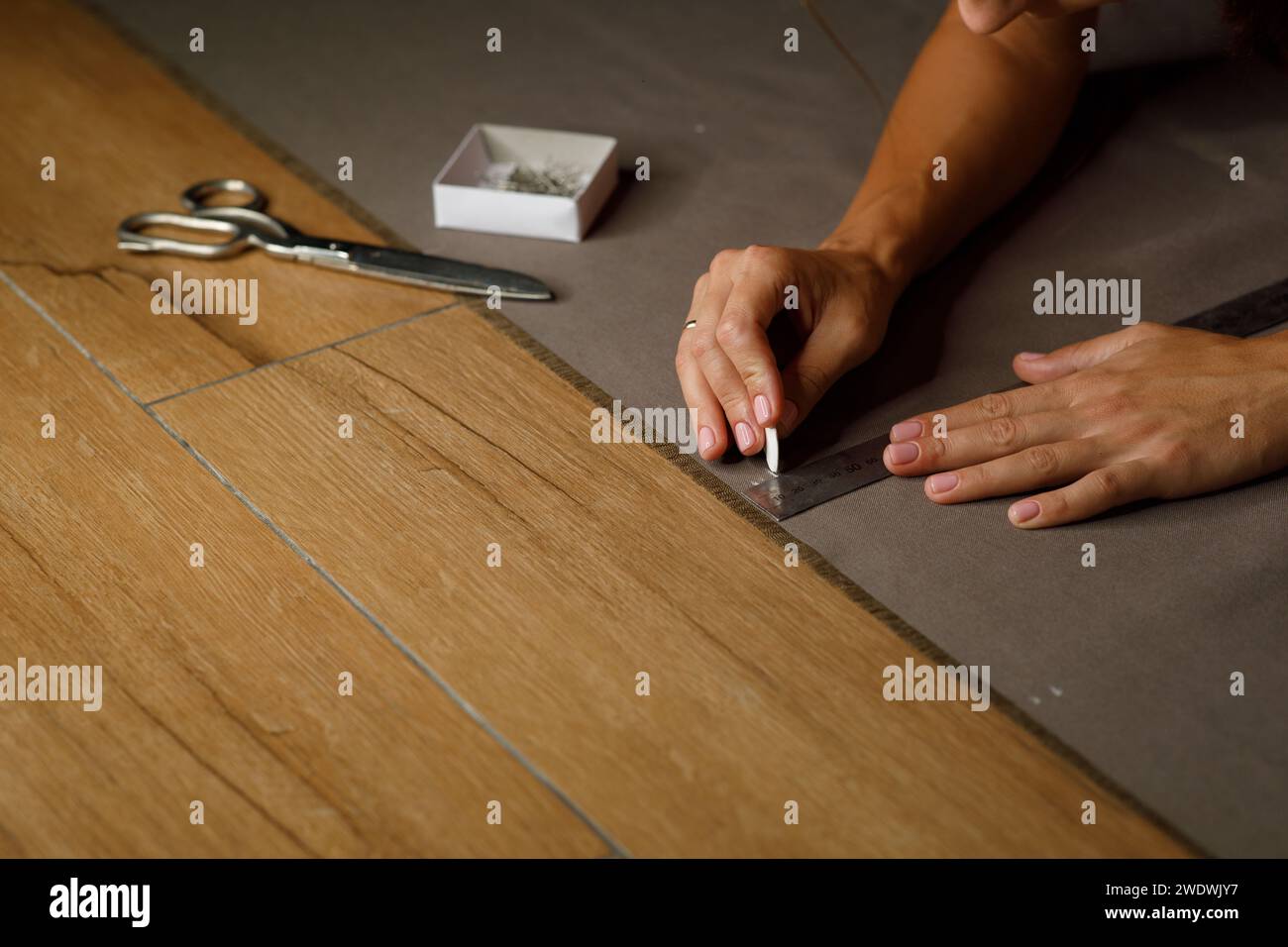 Female seamstress marking pattern hi-res stock photography and images - Alamy