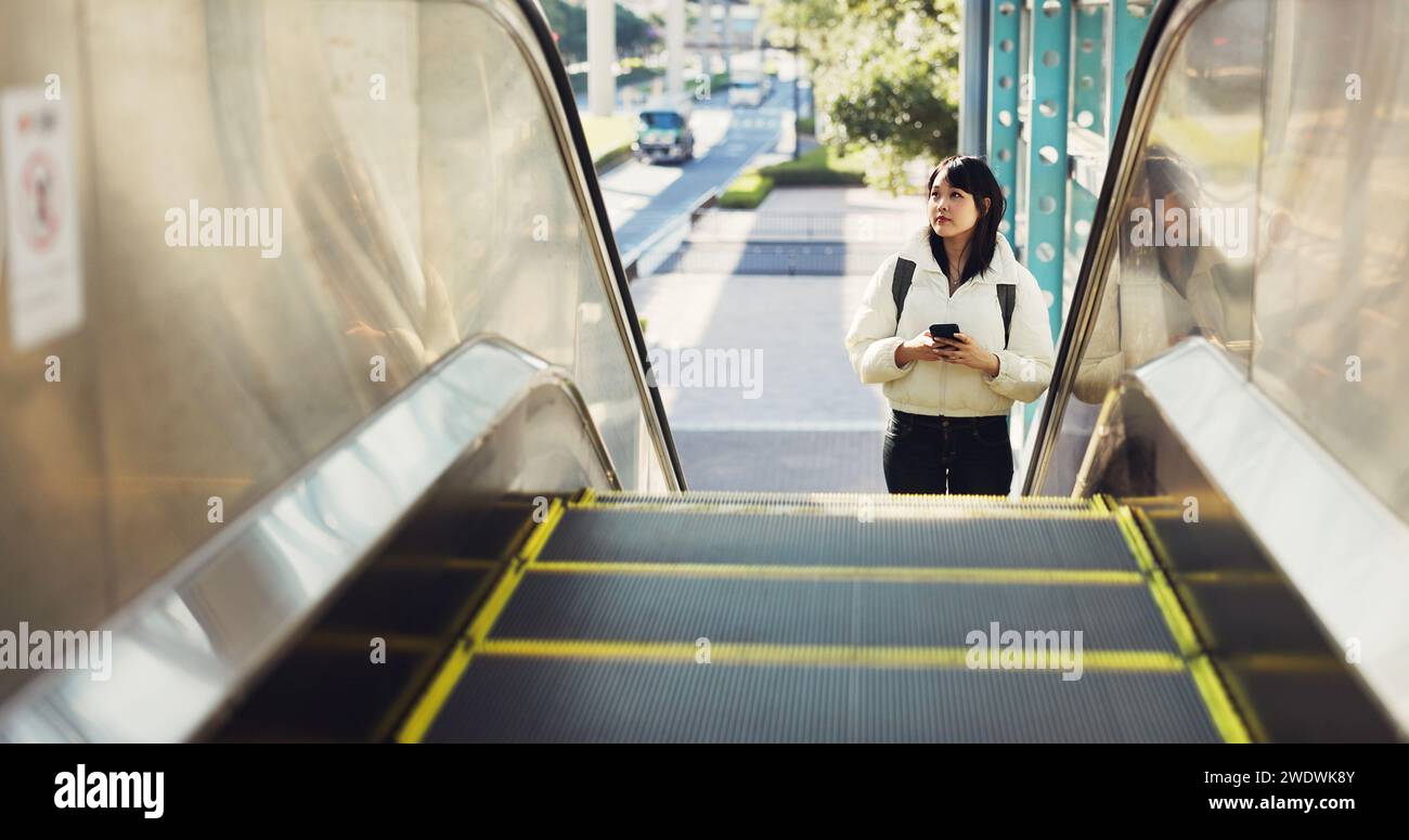 Woman, stairs and smartphone for commute, texting and japanese on ...