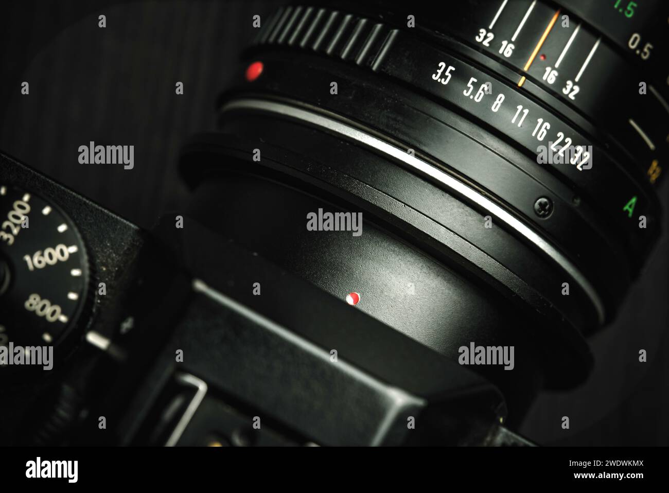 Old fashioned photo lens on a black table Stock Photo - Alamy