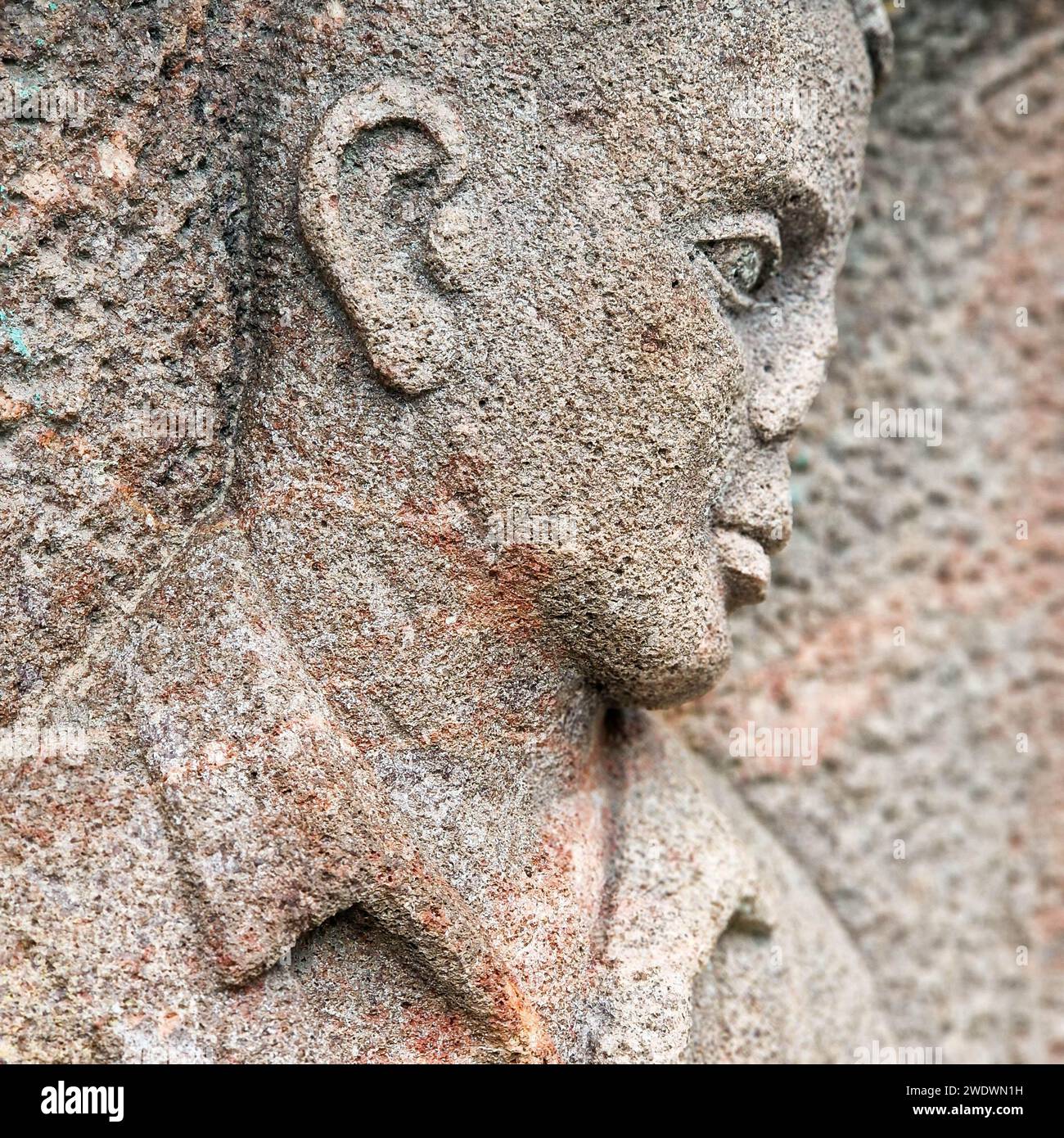 Low-relief sculpture of GDR heroes faces, Prenzlauerberg district ...