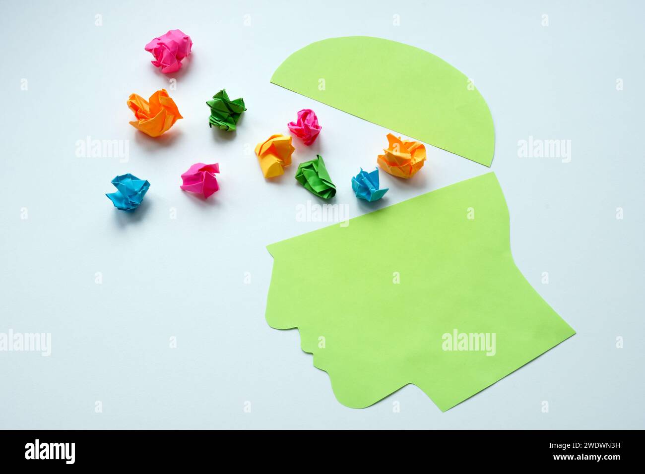 Head and colored paper balls. Positive thinking concept Stock Photo - Alamy