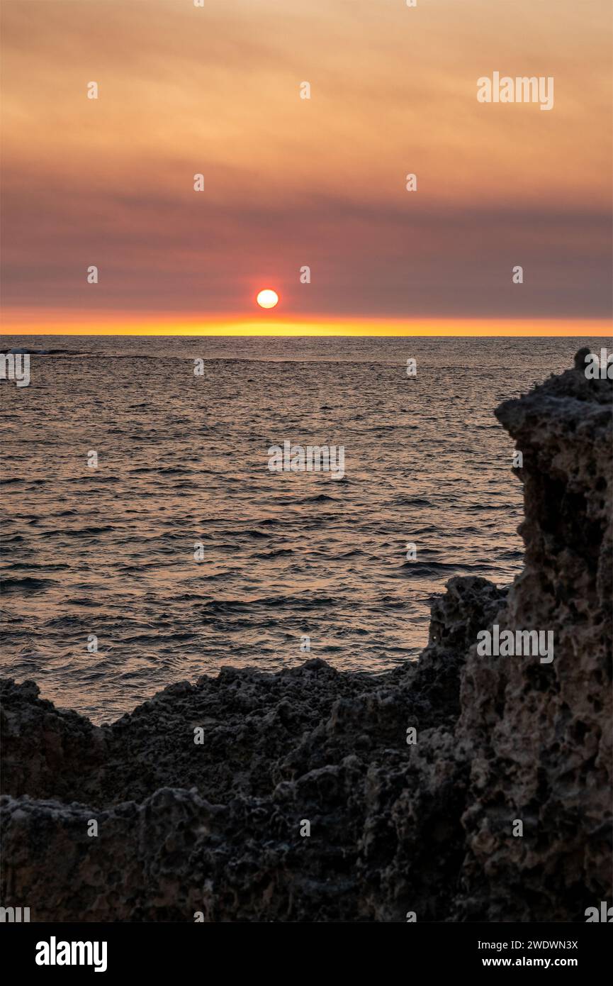 Sun setting over the Indian Ocean at Cape Peron, Rockingham, Western ...