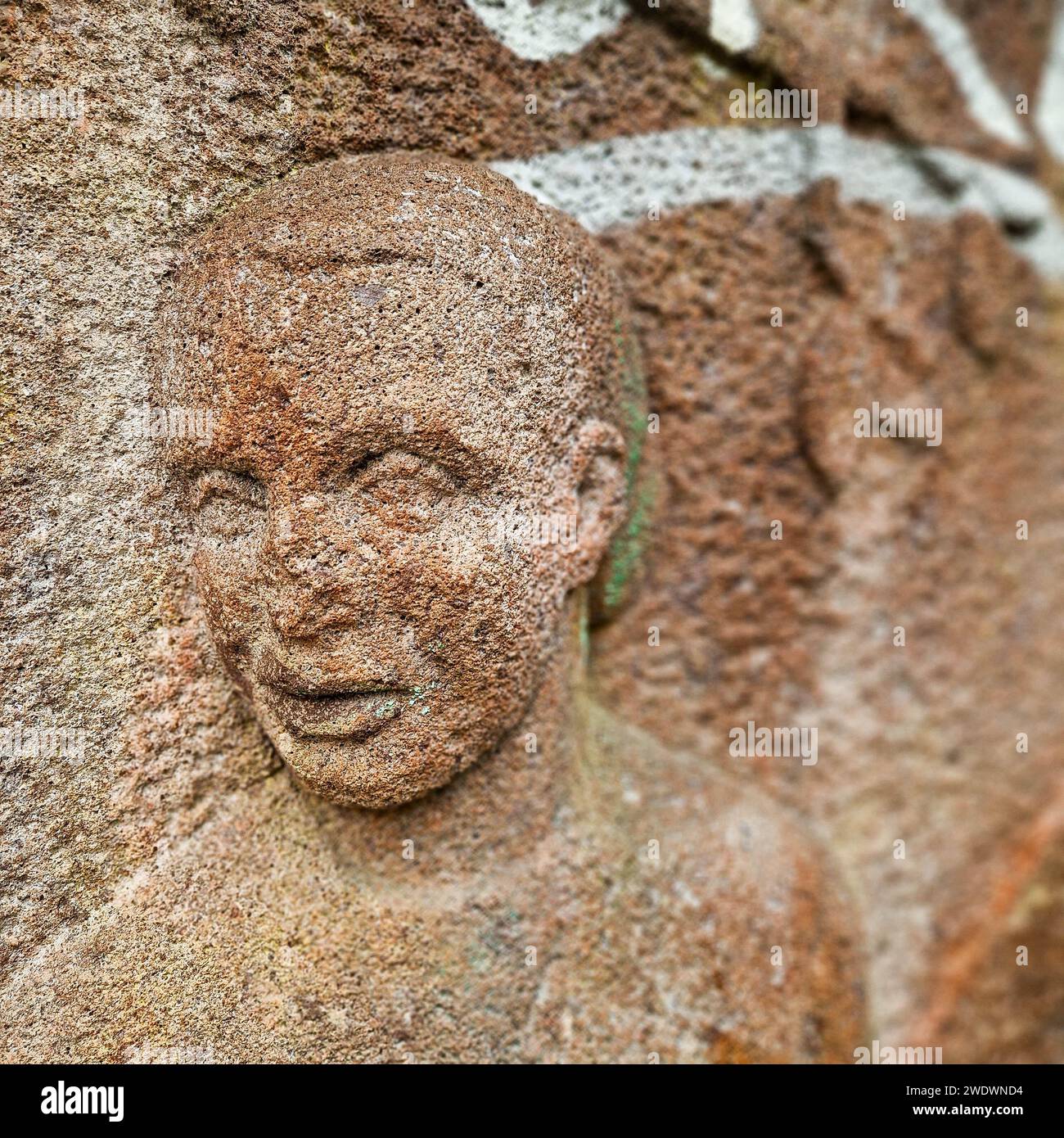 Low-relief sculpture of GDR heroes faces, Prenzlauerberg district ...