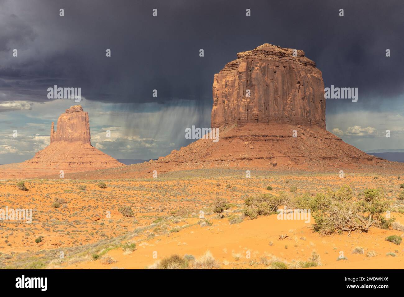 Dark rain clouds and rain in desert. Mesas in Monument Valley Stock ...