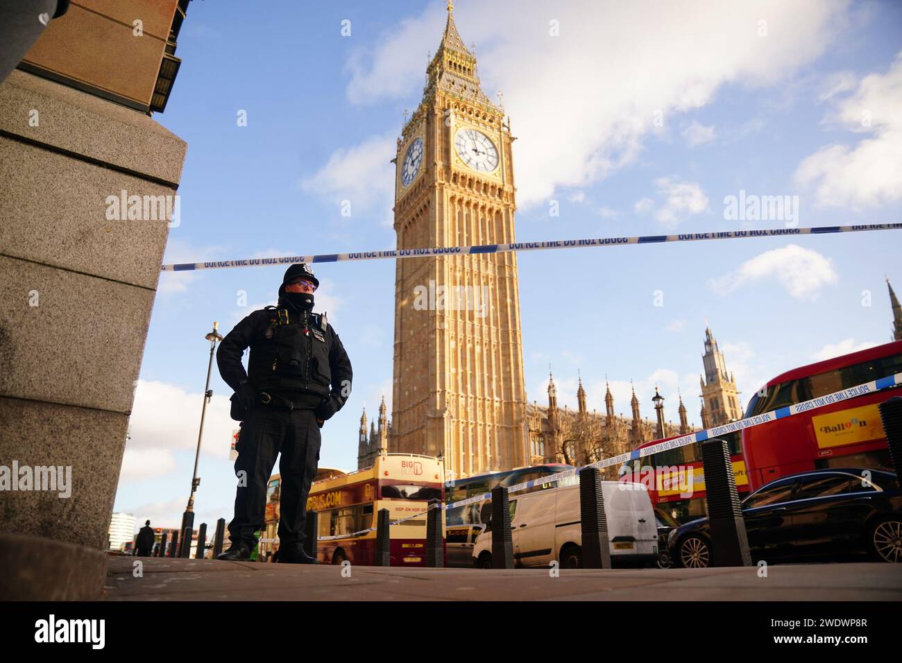 Police cordon off an area around Portcullis House, London, after debris ...
