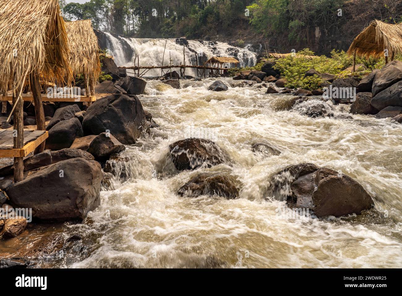 Huts at Tad Lo waterfall in the Bolaven Plateau near Ban Saenvang, Laos ...