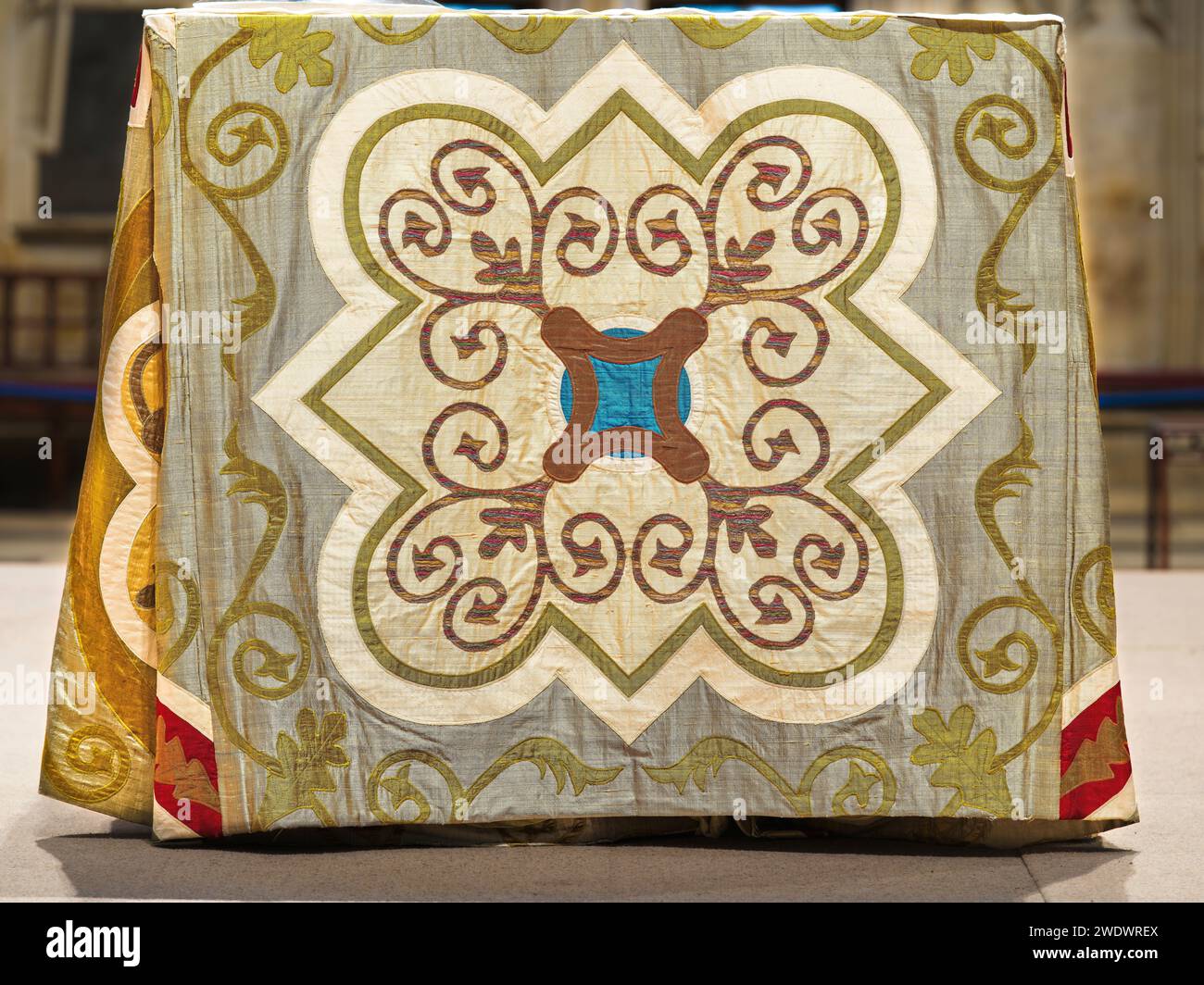 Decorated altar cloth frontal on the main altar in the nave of the ...