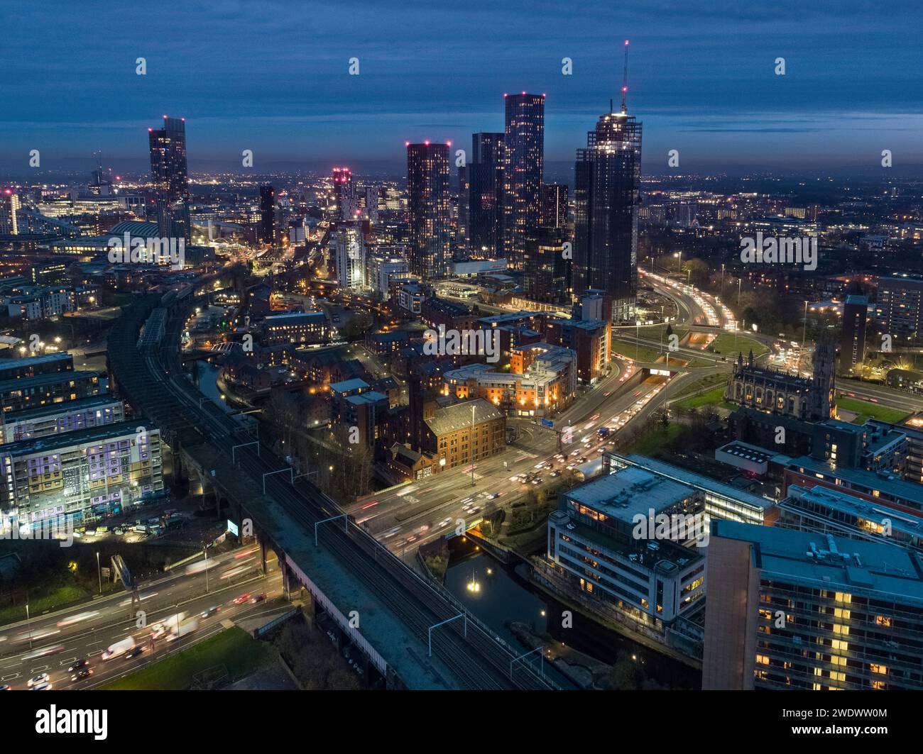 Twilight aerial photograph at rush hour of Mancunian Way, rail bridges ...
