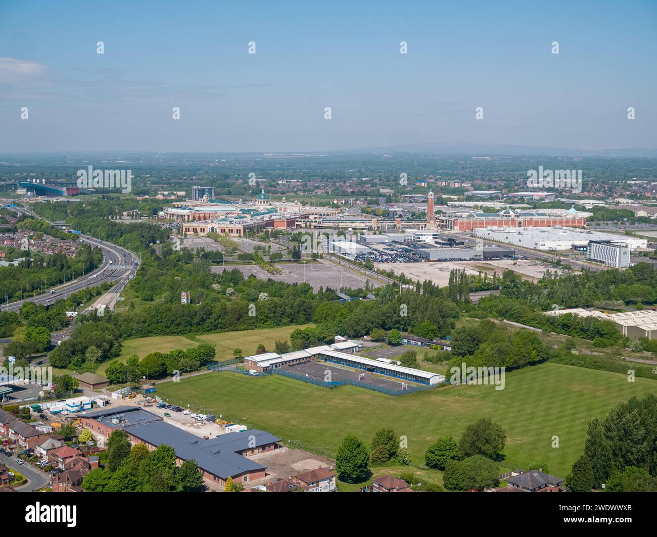 Aerial image of Barton Clough Primary School & the Trafford Centre ...