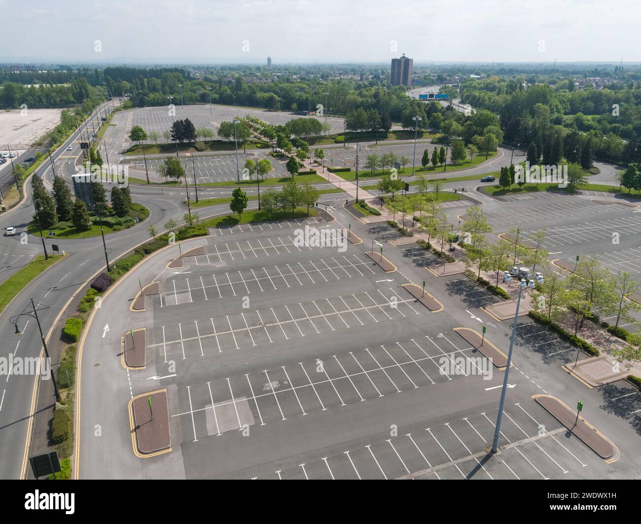 Aerial photograph of an empty tree lined car park at the Trafford ...