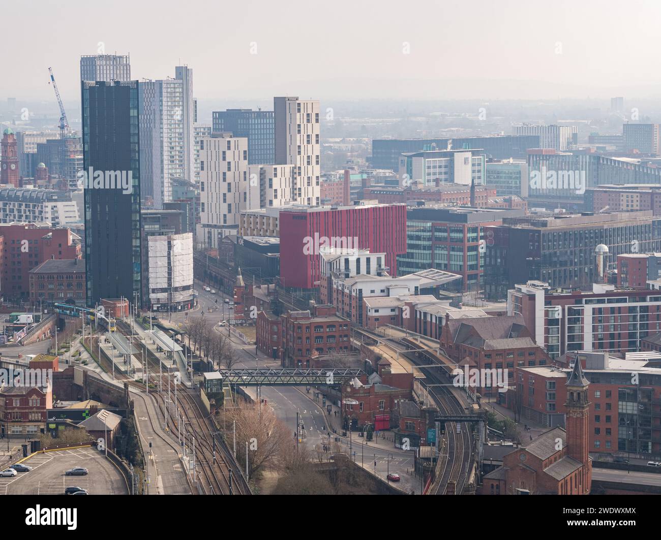 Aerial image of train and tram lines leading int Manchester city centre ...