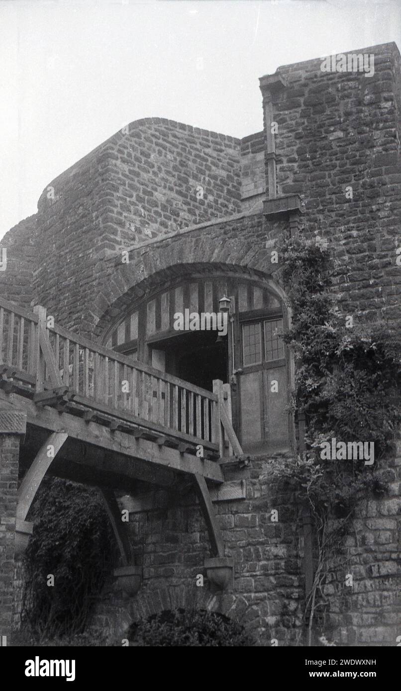 1960s, historical, view of the wooden bridge over the moat at the rear ...