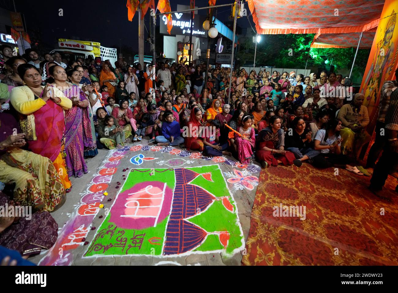 People participate in a ritual during a celebration of the grand ...