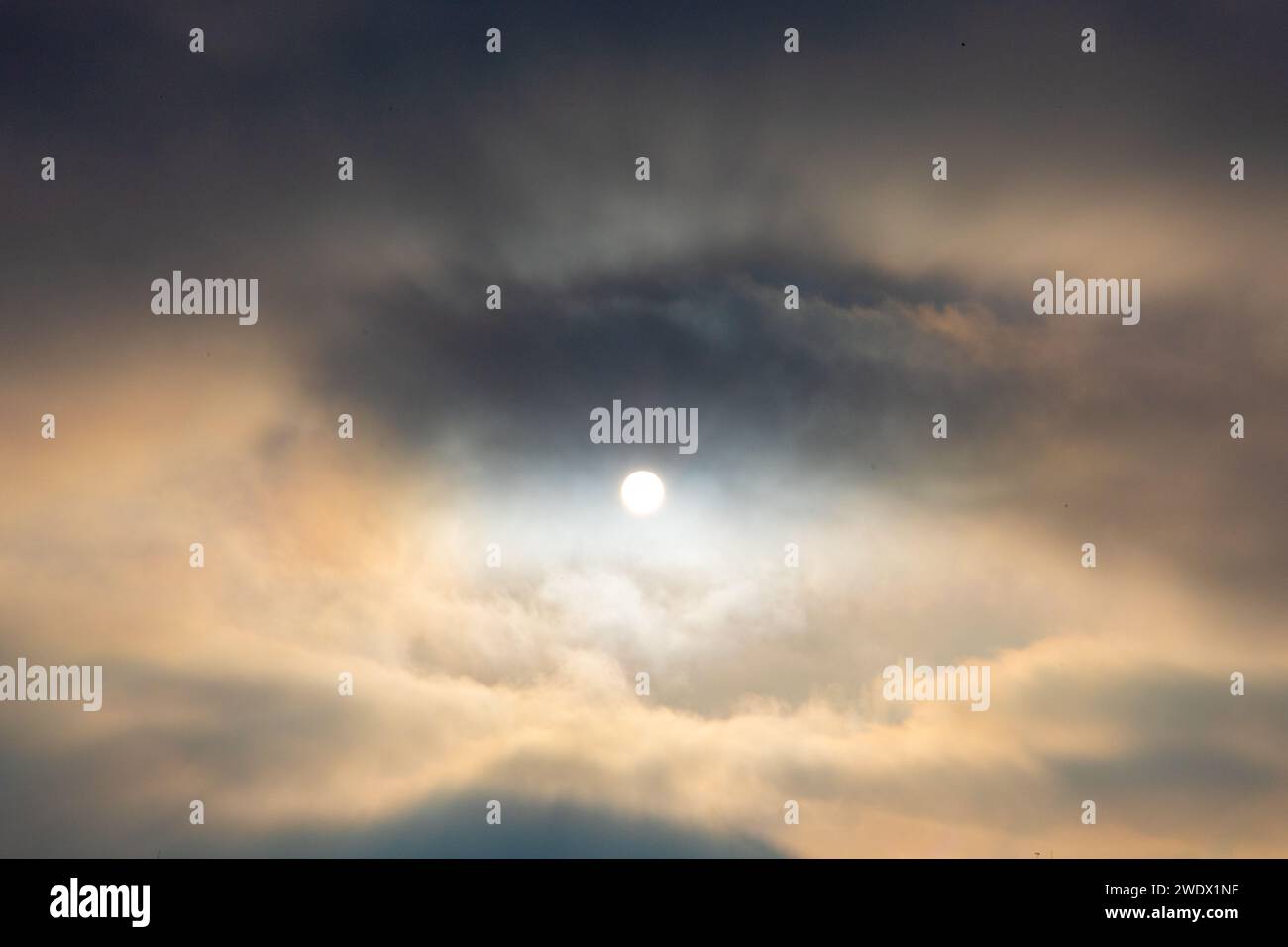 sunrise in winter with dramatic sky, clouds and rising sun in Germany ...