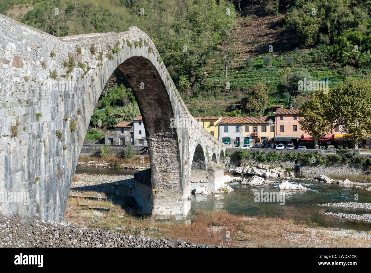 Ancient stone bridge, the medieval Ponte Maddalena, or Devils Bridge ...