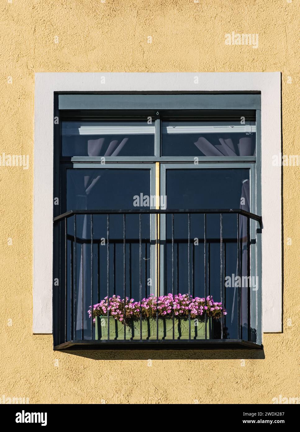 Facade of the house and window with flowers, street photo. Window ...