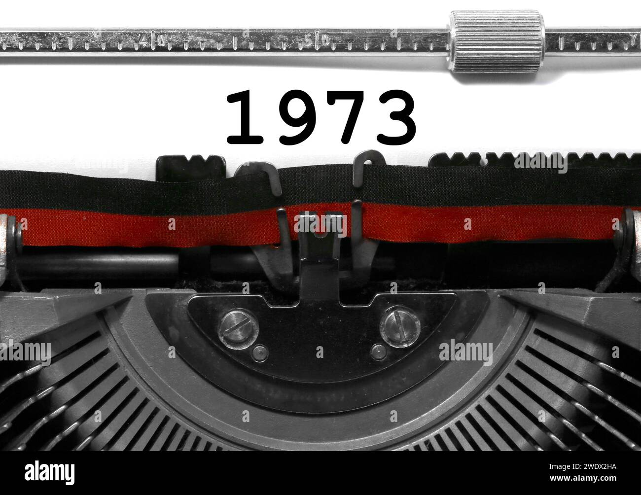 Text 1973 typed on a typewriter on a sheet of white paper Stock Photo ...