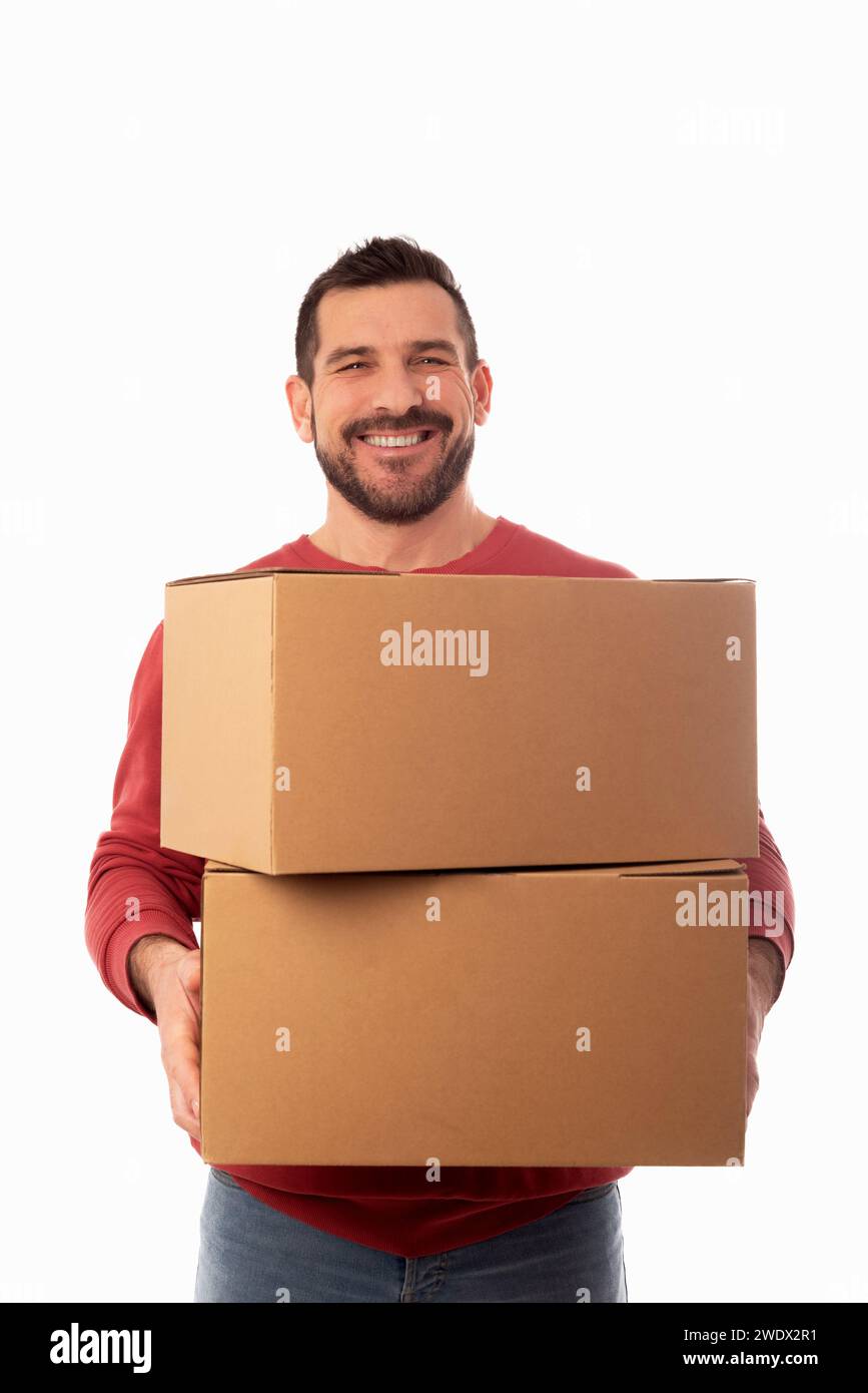Bearded man on white background holding large cardboard boxes. Delivery ...