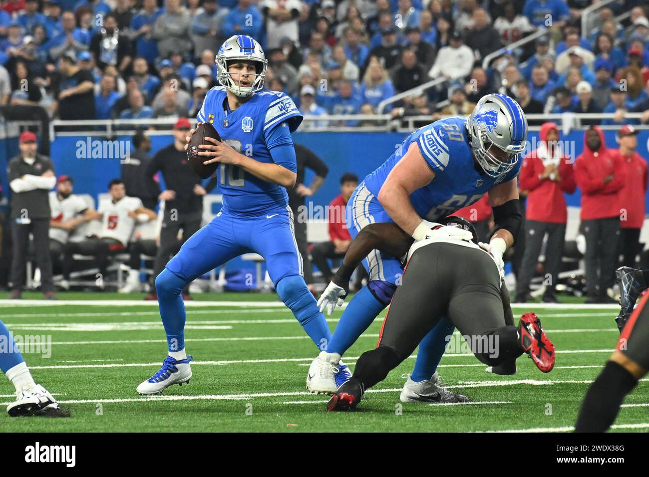 DETROIT, MI - JANUARY 21: Detroit Lions quarterback (16) Jared Goff looks for a receiver while ...