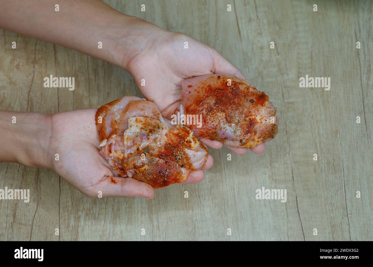 Cooking meat hands hi-res stock photography and images - Alamy