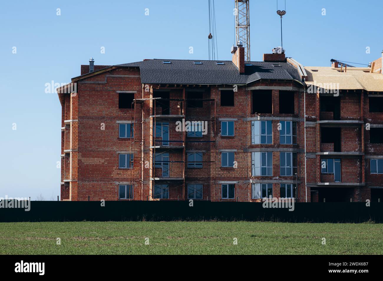crane house construction and repair Stock Photo - Alamy