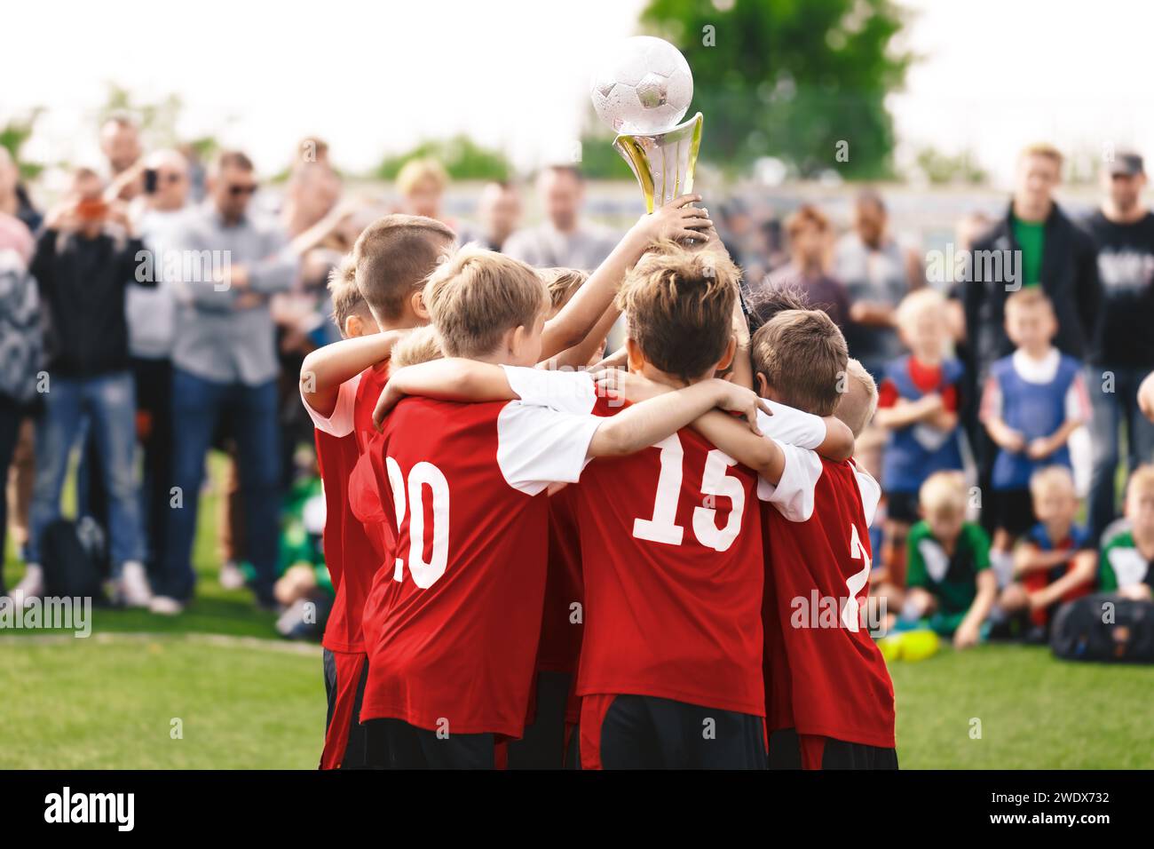 Happy children winning sports tournament. Kids in sports teams win ...