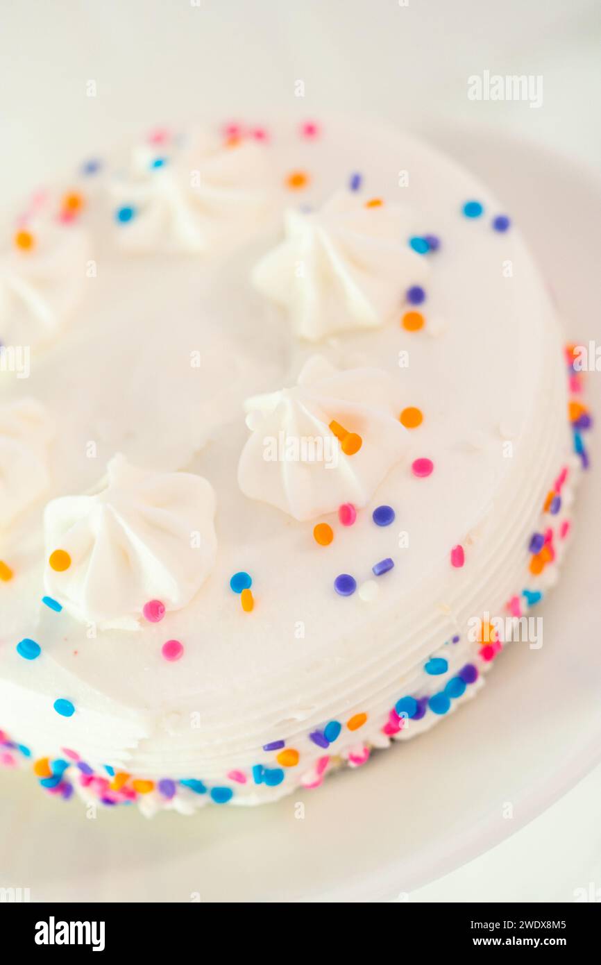 Birthday cake with funfetti sprinkles Stock Photo - Alamy