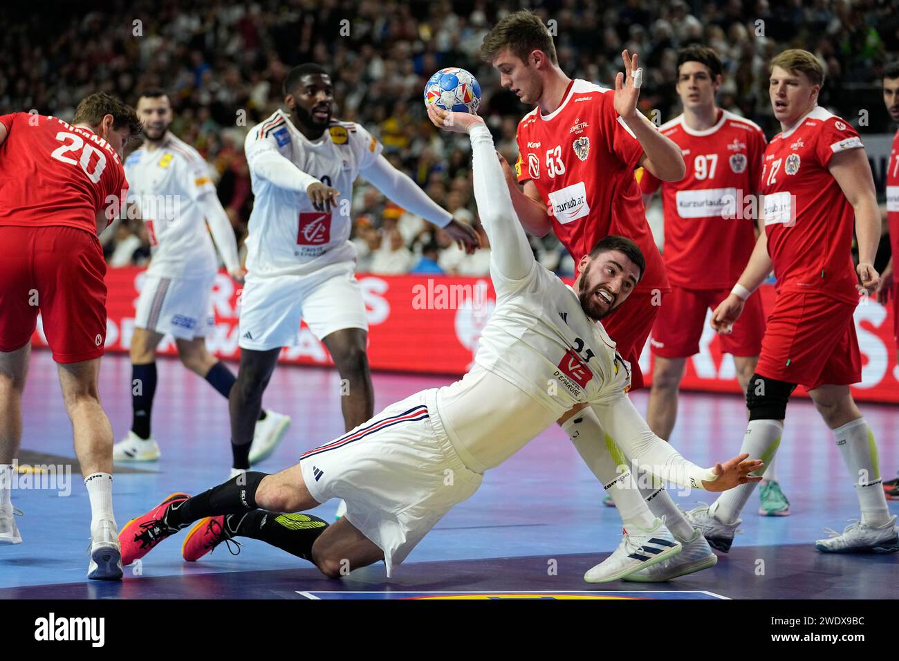 France's Ludovic Fabregas is fouled by Austria's Mykola Bilyk during ...