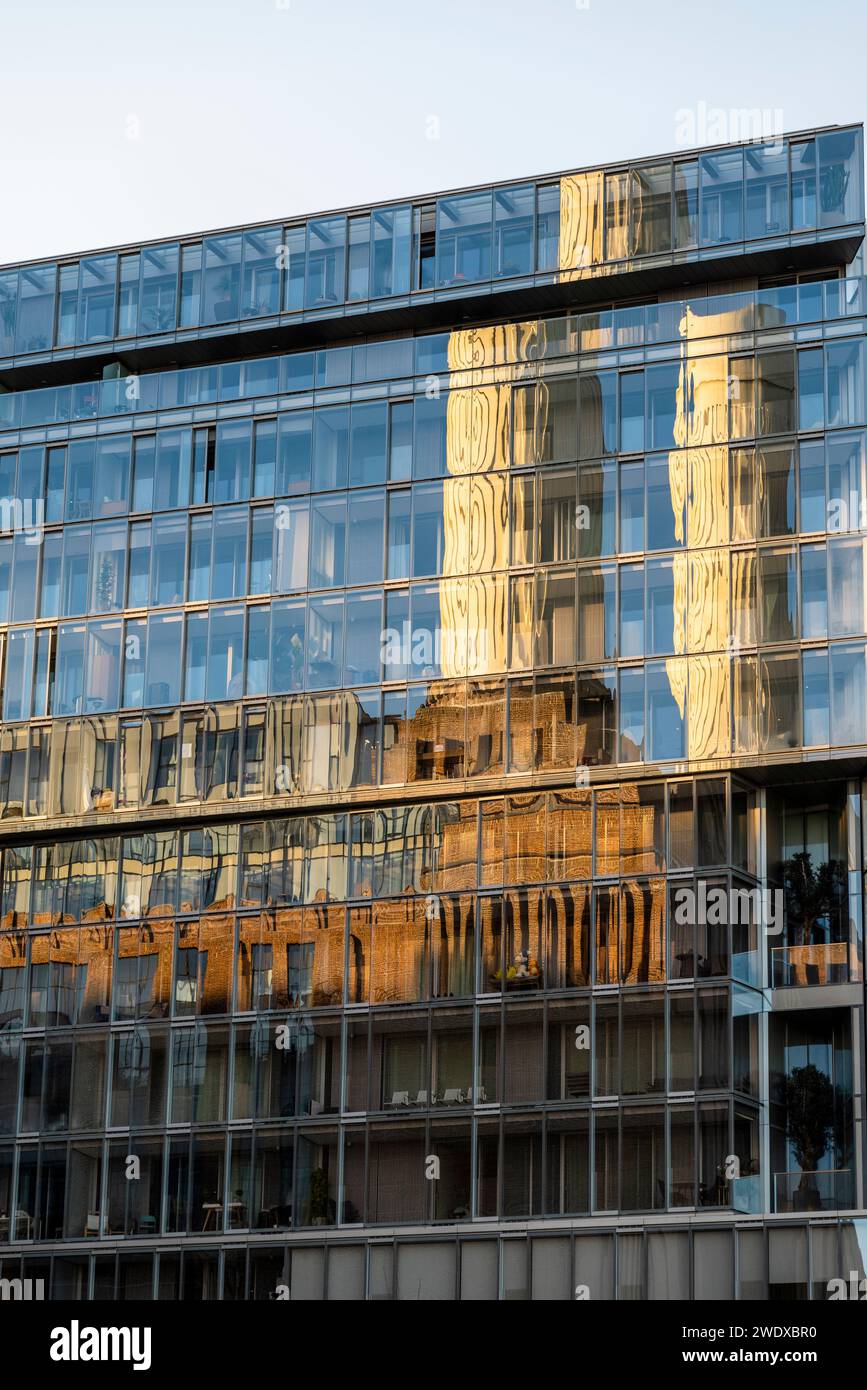 Battersea Power Station reflected on glass building, London, England ...