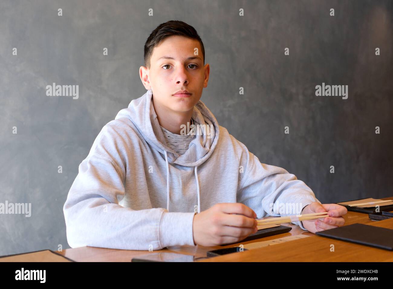 Study sitting boy from hi-res stock photography and images - Alamy
