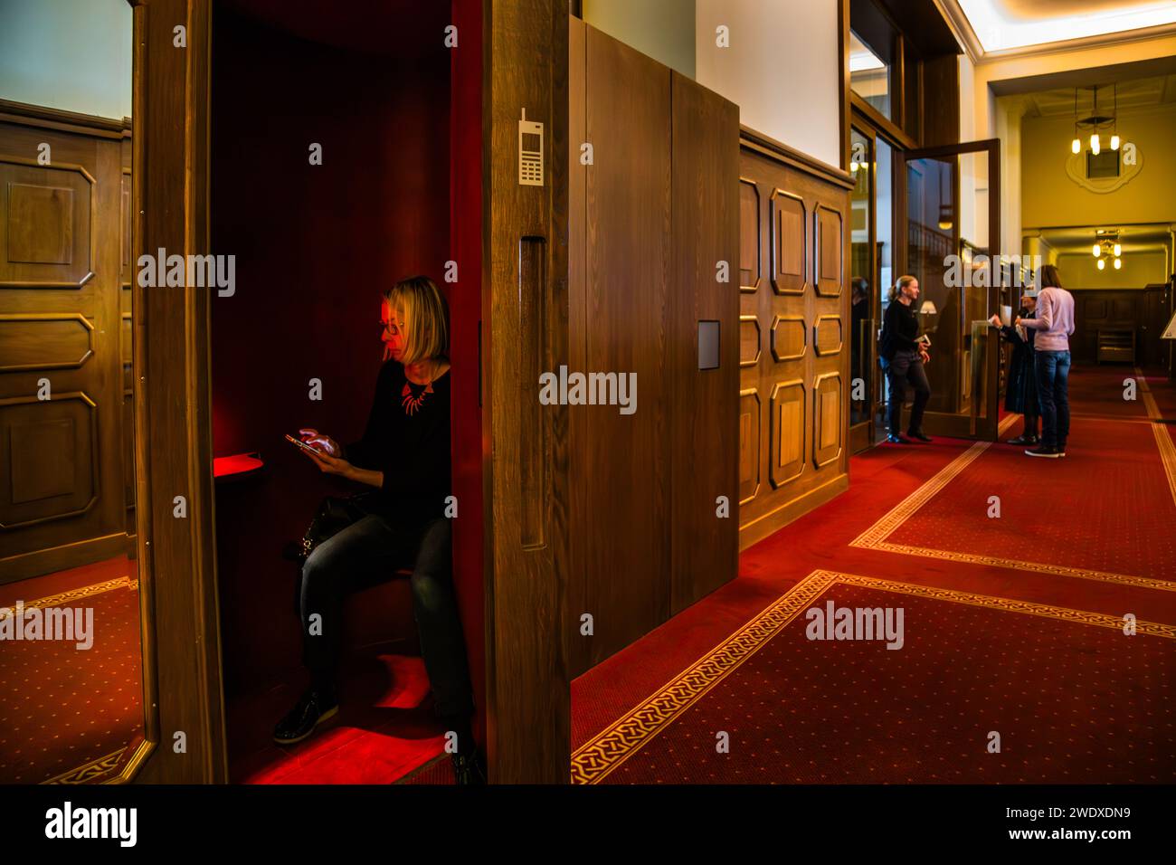 The old telephone booth in the Waldhaus is now a cell phone retreat for ...
