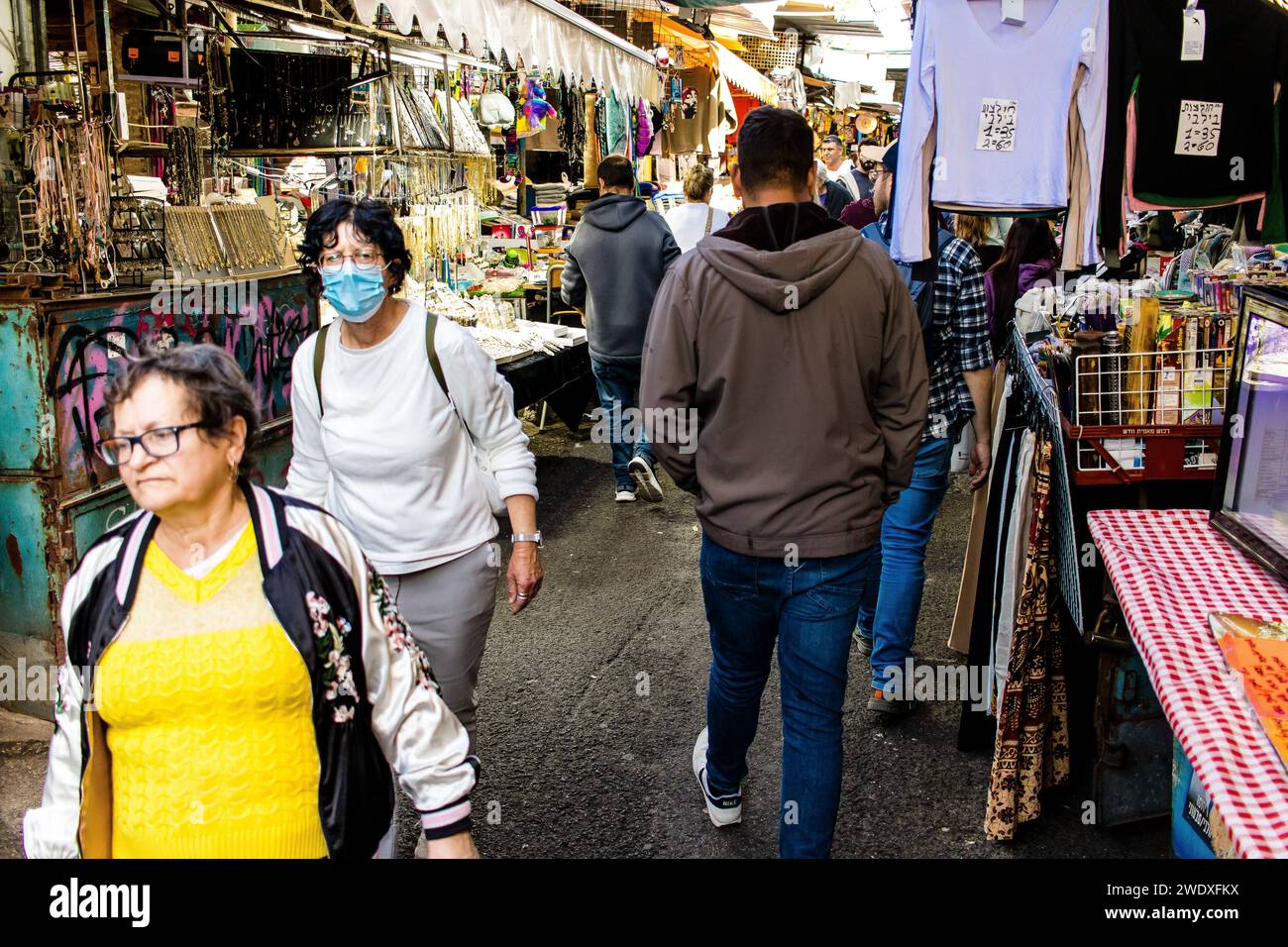 Tel Aviv, Israel - January 22, 2024 People shop at the Carmel market ...