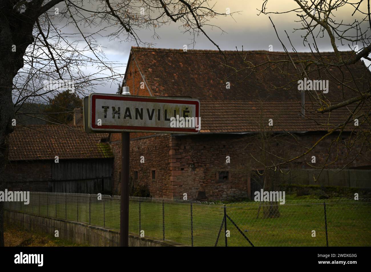 Antique sign at the entrance of the picturesque village of Thanvillé in ...