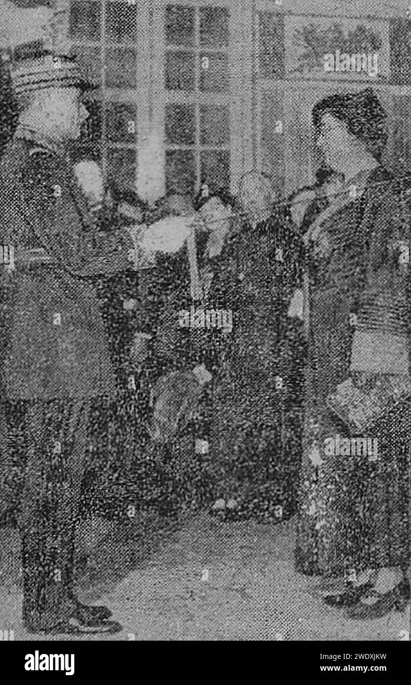 Accolade of Louise Thuliez by gen. Maxime Weygand (1935 Stock Photo - Alamy