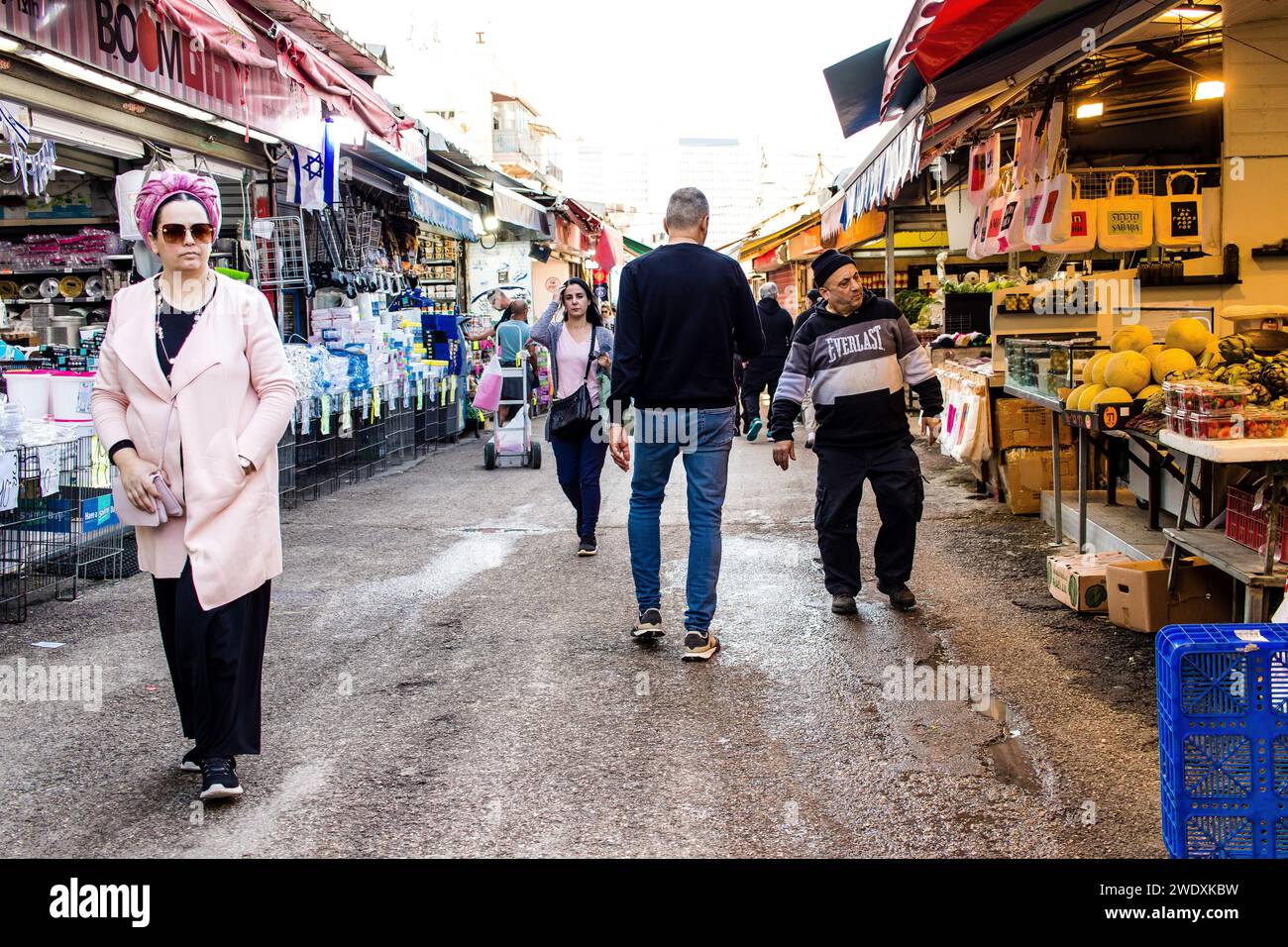 Tel Aviv, Israel - January 22, 2024 People shop at the Carmel market ...