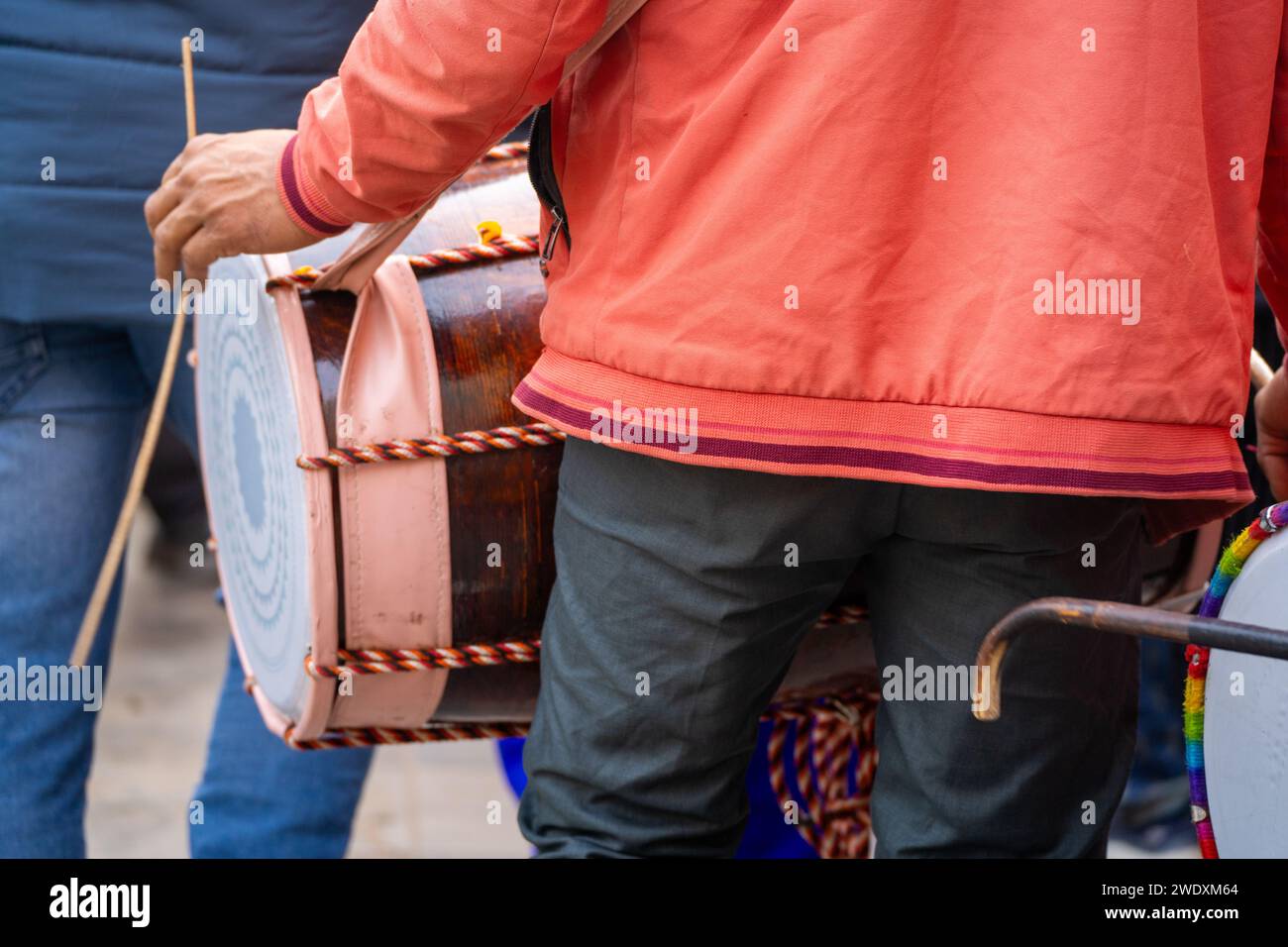 Zoomed in shot showing dhol drummer an indian instrument used in ...
