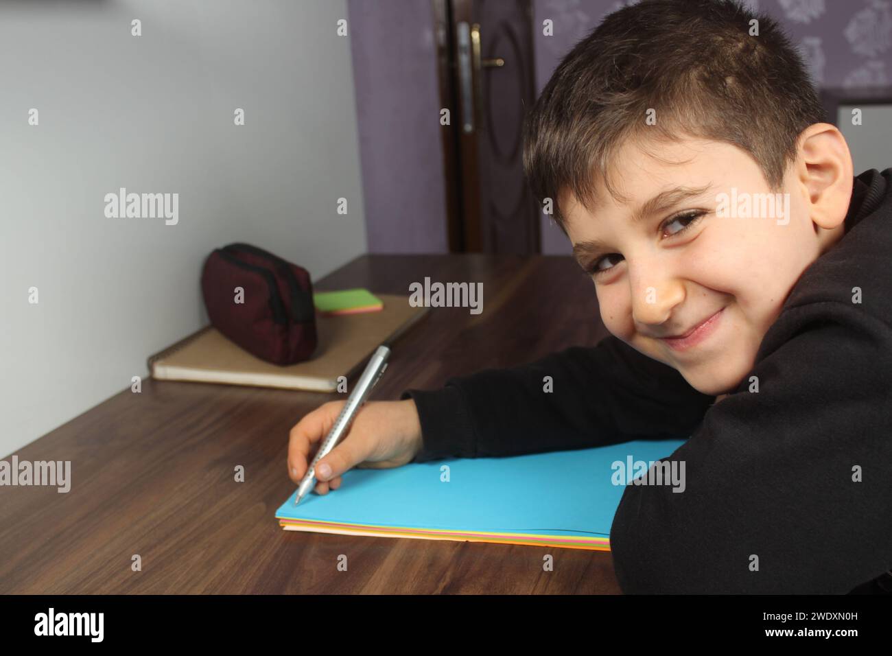 Distance learning online education. A schoolboy boy studies at home and ...