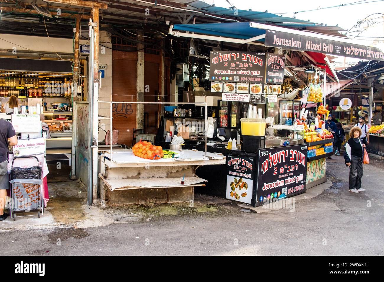 Tel Aviv, Israel - January 22, 2024 People shop at the Carmel market ...