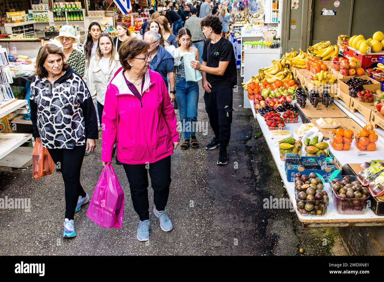 Tel Aviv, Israel - January 22, 2024 People shop at the Carmel market ...