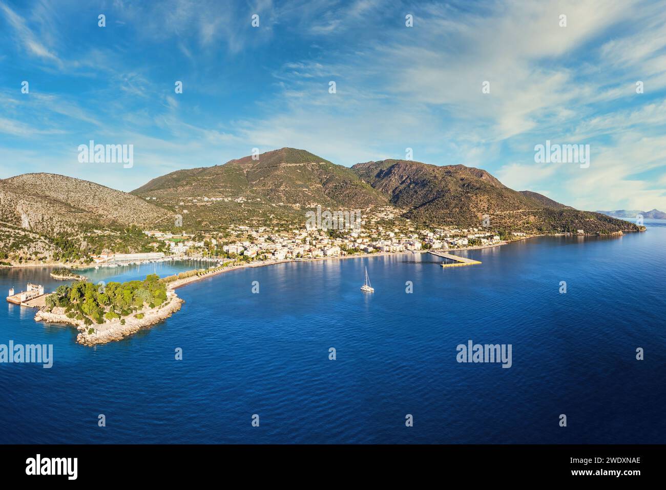 The spa town of Methana peninsula with its two steep volcanic slopes ...