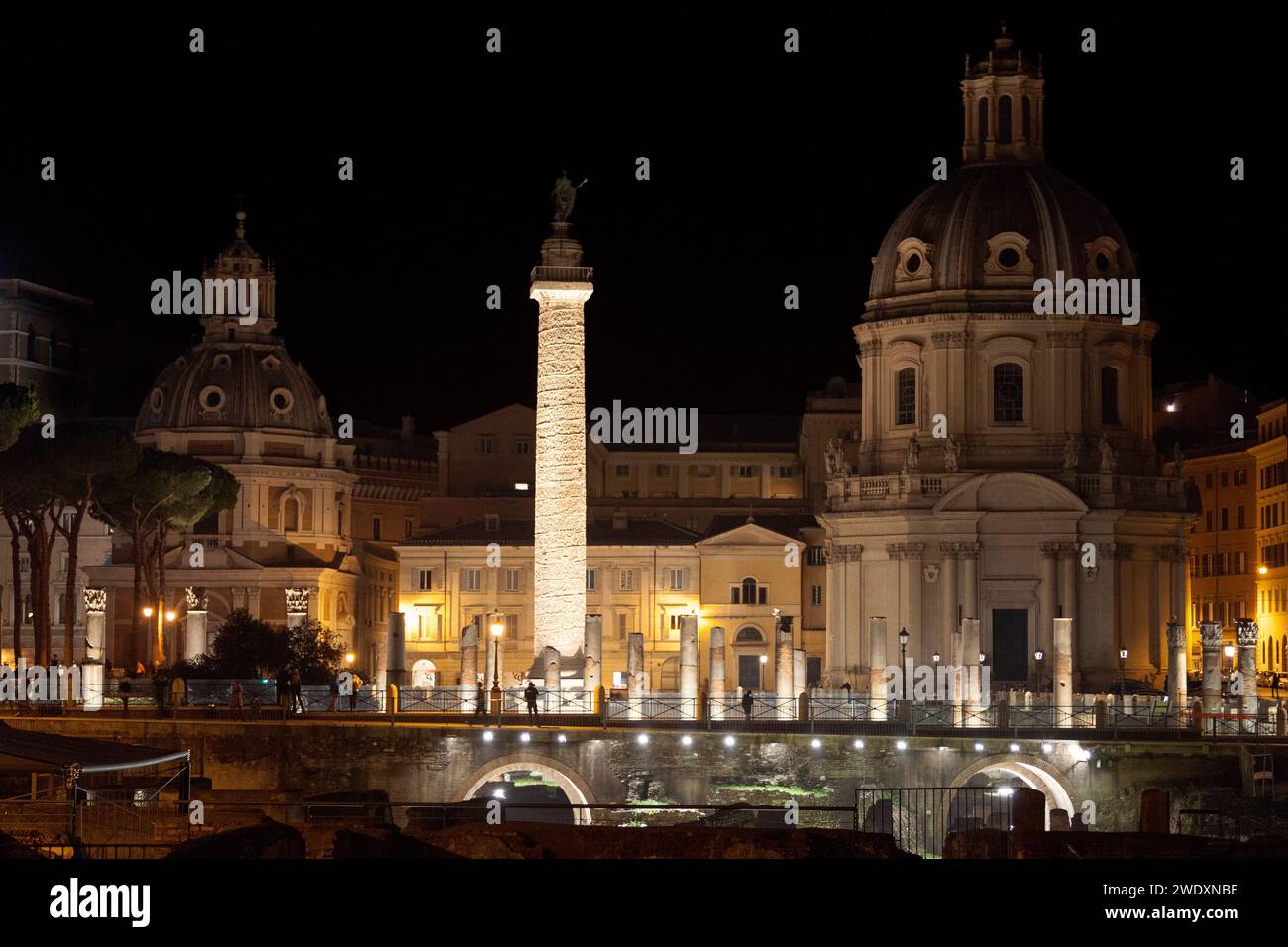 The Trajan's Forum by night with behind, the Chiesa SS Nome di María ...
