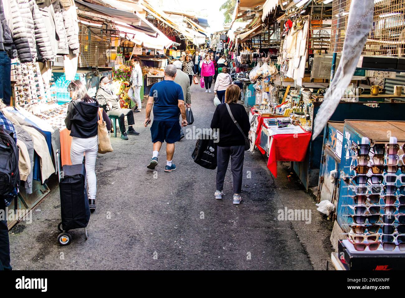 Tel Aviv, Israel - January 22, 2024 People shop at the Carmel market ...