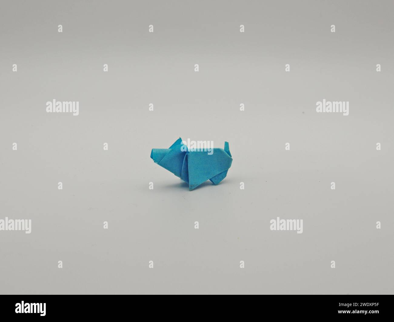 origami of a little blue pig Stock Photo - Alamy