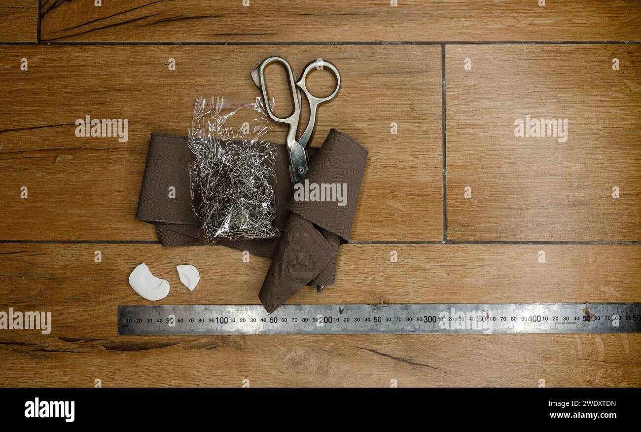 fabric marking hands ruler seamstress tools Stock Photo - Alamy