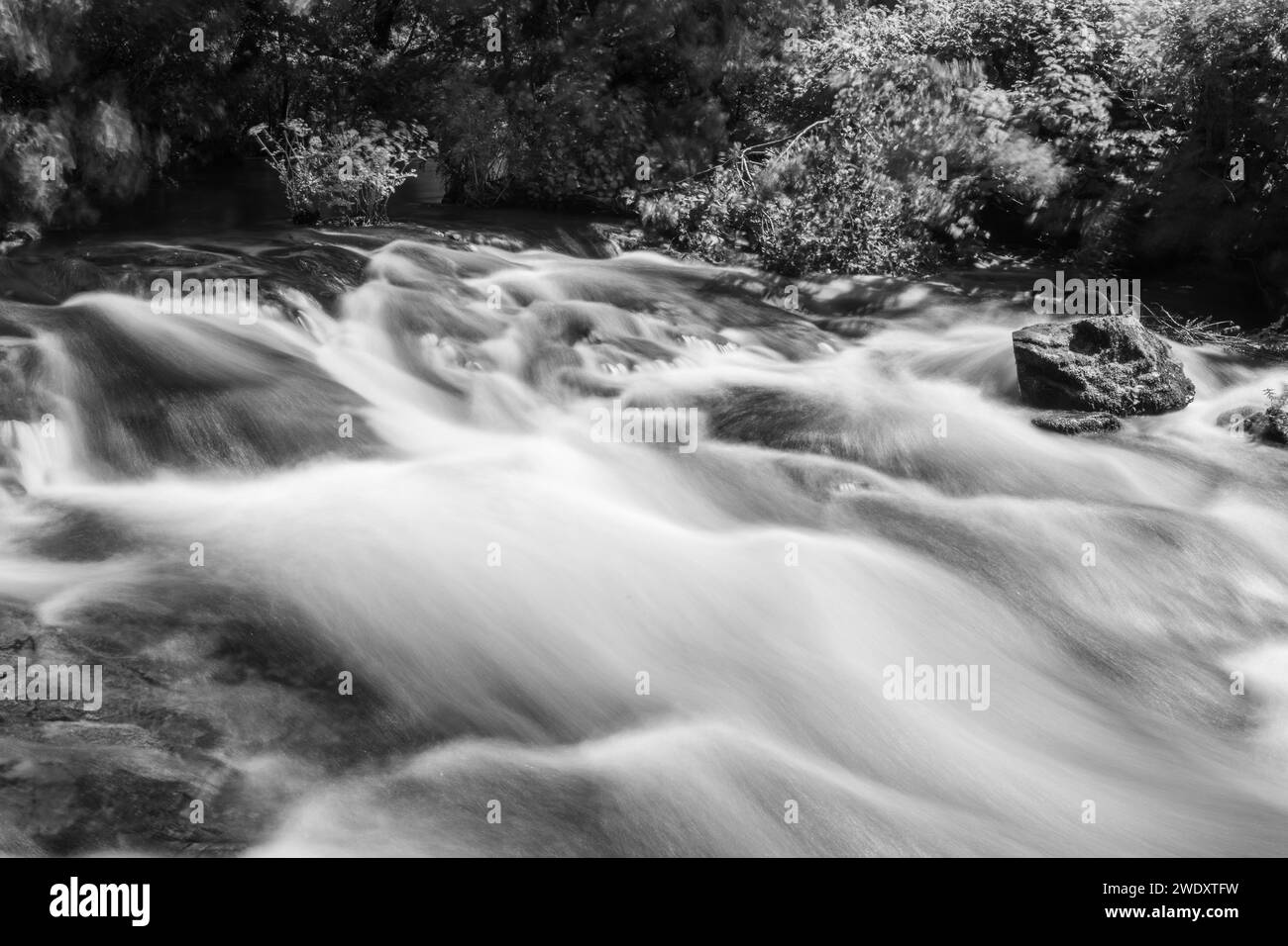 Long exposure of a waterfall on the East Lyn river flowing through the ...