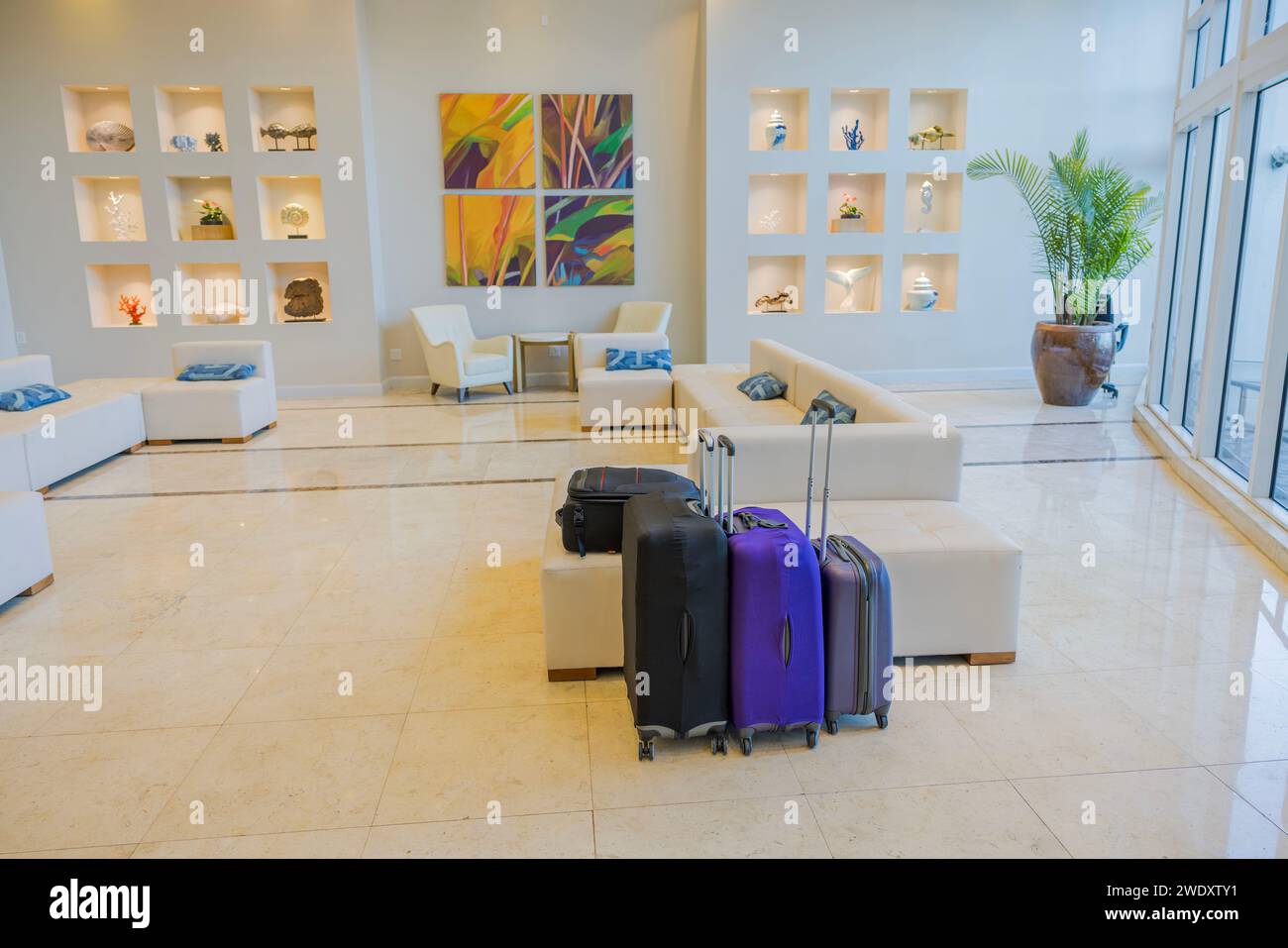 Close-up view of suitcases in the lobby at the reception during tourist ...
