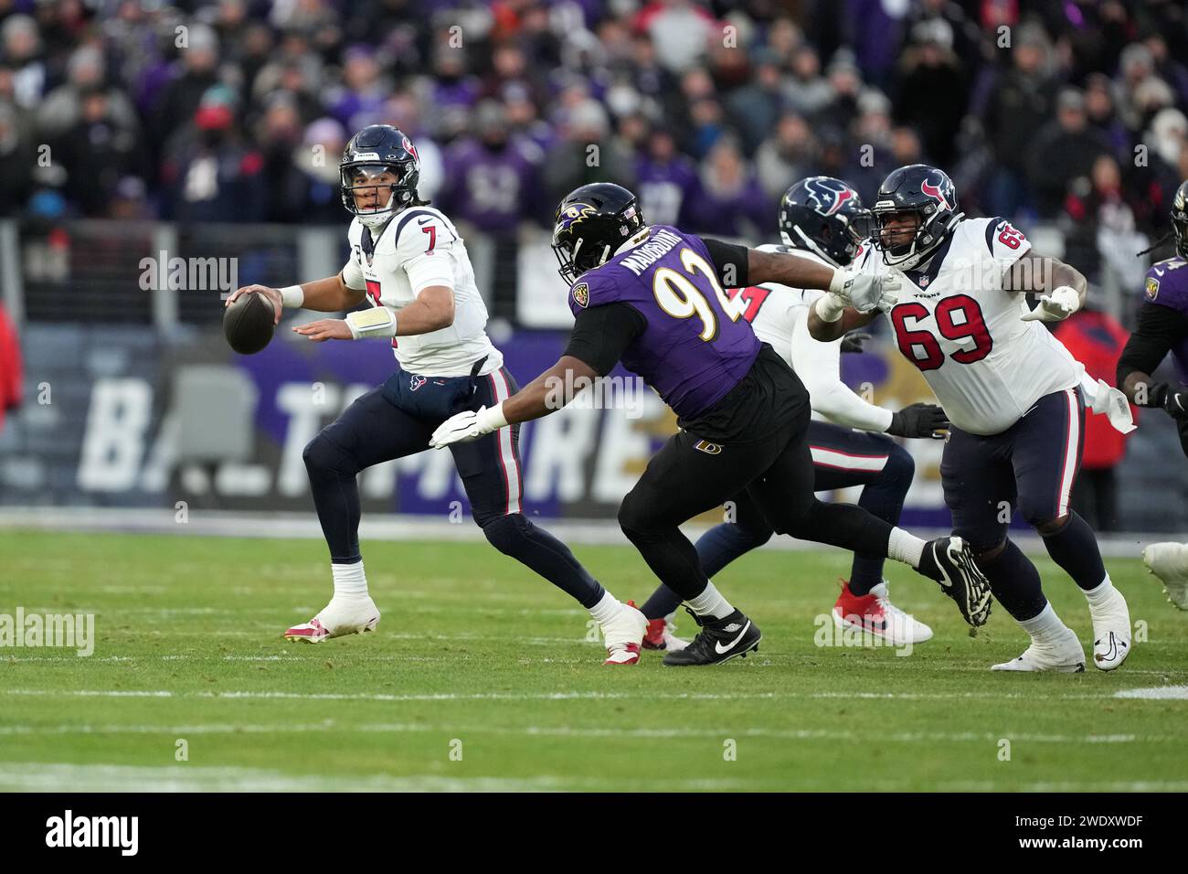 BALTIMORE, MARYLAND, JAN 20: Houston Texans quarterback C.J. Stroud (7) throws the ball under ...