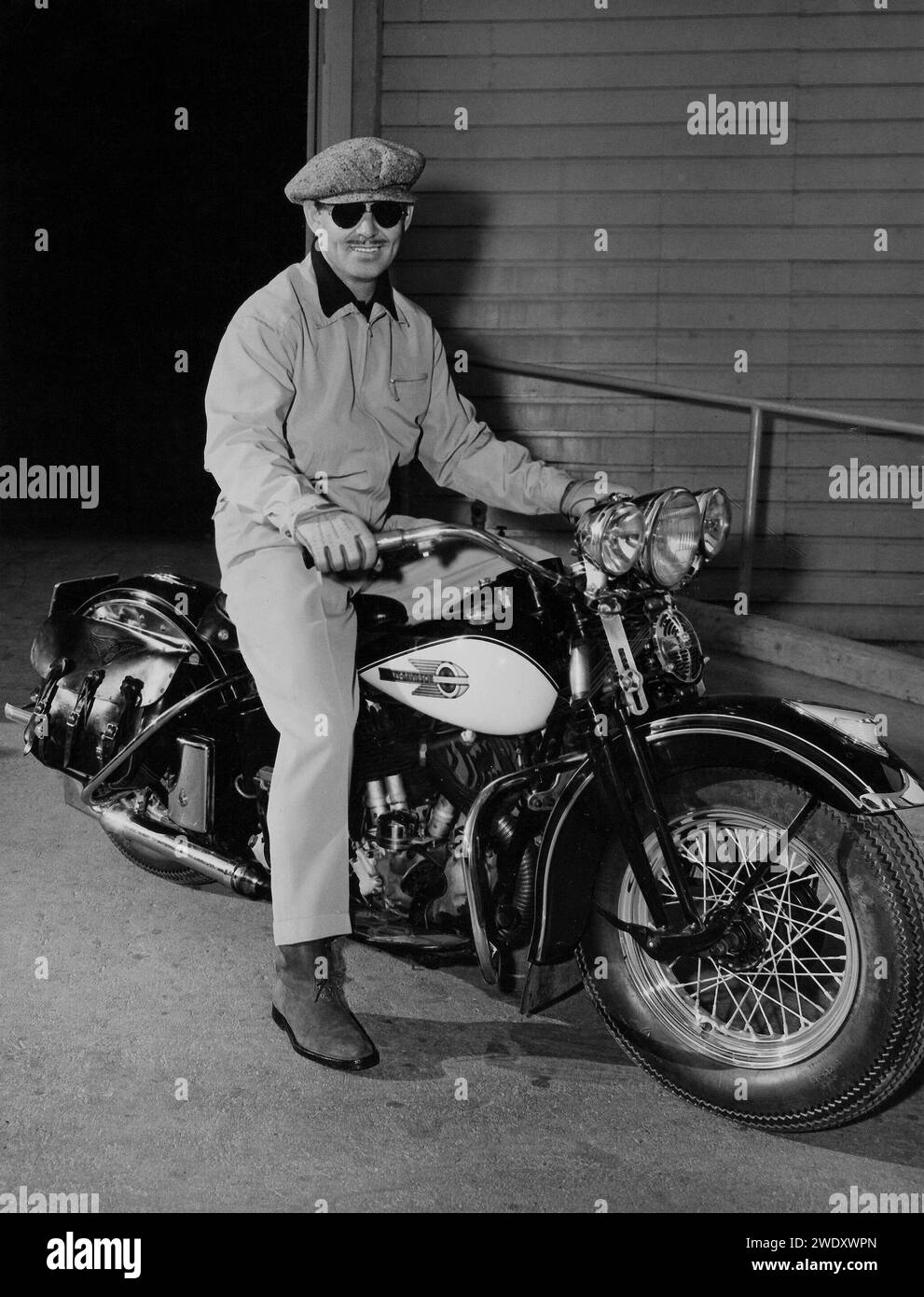 Clark Gable on a Harley-Davidson motorcycle (MGM, March, 1942 Stock ...